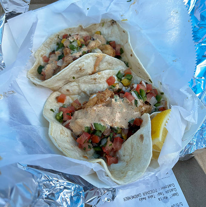 Fish tacos bring a lighter option&mdash;crispy seafood nestled in soft tortillas with fresh pico de gallo creating a perfect handheld feast.