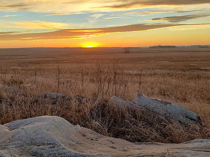Day's end spectacle: The prairie bids farewell to another day with a sunset that turns ordinary rocks and grasses into extraordinary art.