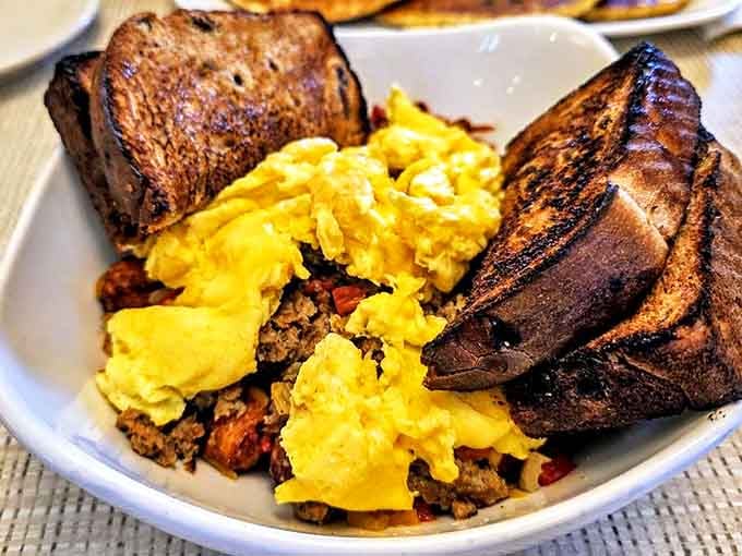 Savory meets sweet in this hearty breakfast bowl, where eggs and toast provide the perfect balance to start your day.