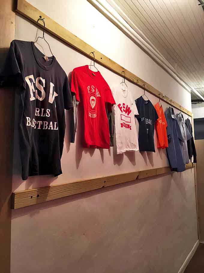 A nostalgic display of school spirit, with FSW athletic shirts and jackets preserving local sports history for future generations.