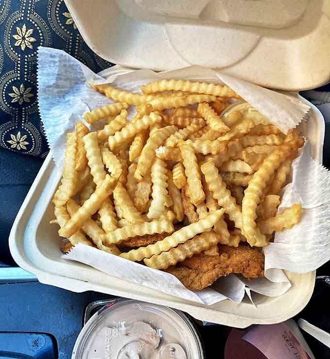 A humble vessel carrying precious cargo &ndash; Ray's takeout experience brings drive-in magic to wherever you call your dinner table.