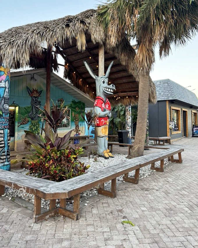 Thatched roof, tiki vibes, and that signature donkey statue create the perfect tropical backdrop for your ice cream adventure. Vacation mode: activated.