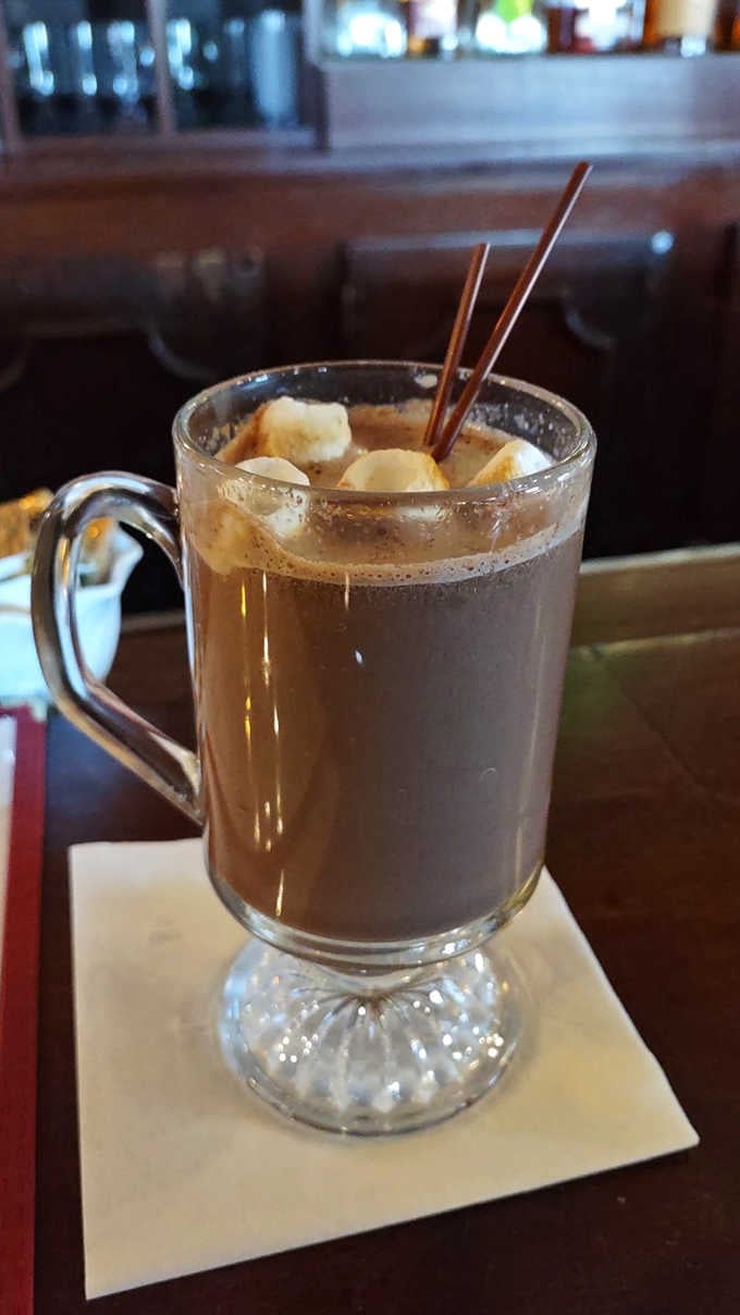 Winter in Wisconsin calls for serious hot chocolate &ndash; served in a glass mug with whipped cream and chocolate sticks for stirring.