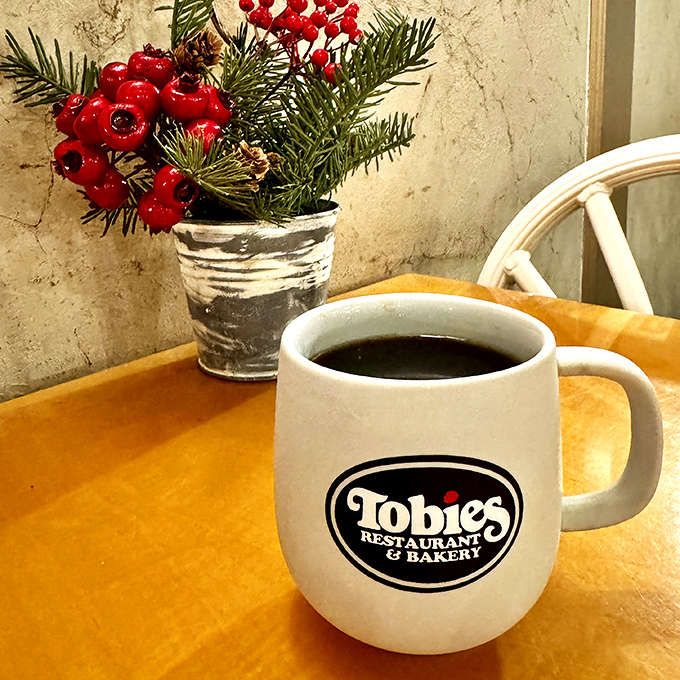 That Tobie's mug isn't just holding coffee &ndash; it's holding liquid motivation to face whatever Minnesota weather throws your way.