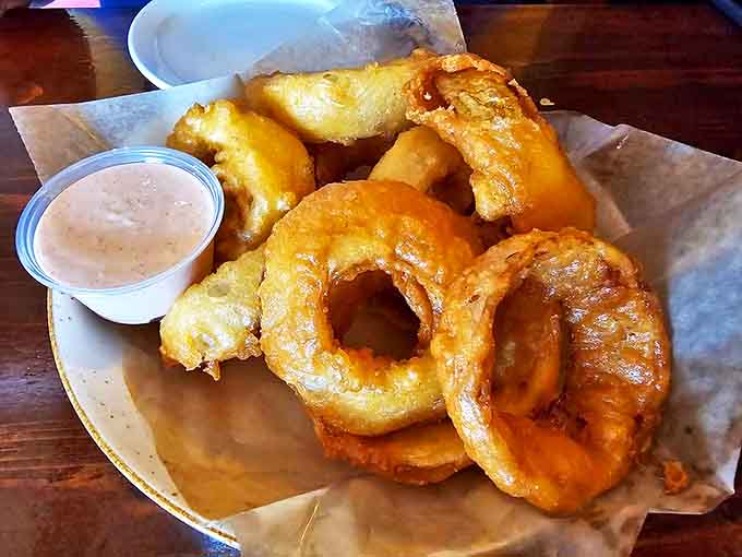 Golden-battered onion rings with that perfect crunch-to-sweetness ratio &ndash; the kind that make you wonder why you'd ever settle for frozen again.