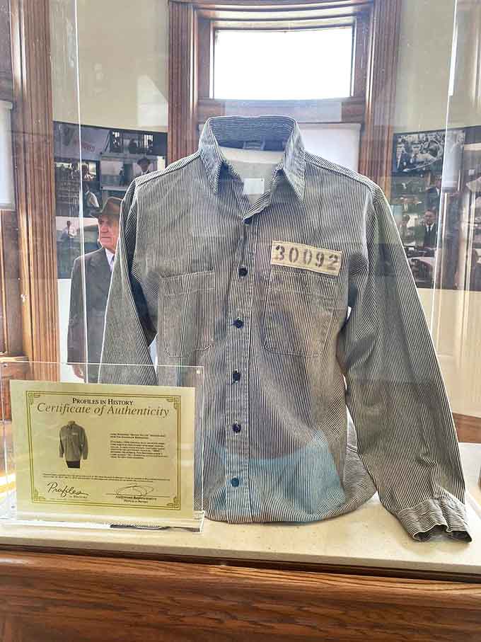 Fashion statement: Prison chic hasn't caught on in Milan yet, but this authentic uniform with identification number speaks volumes about institutional identity.