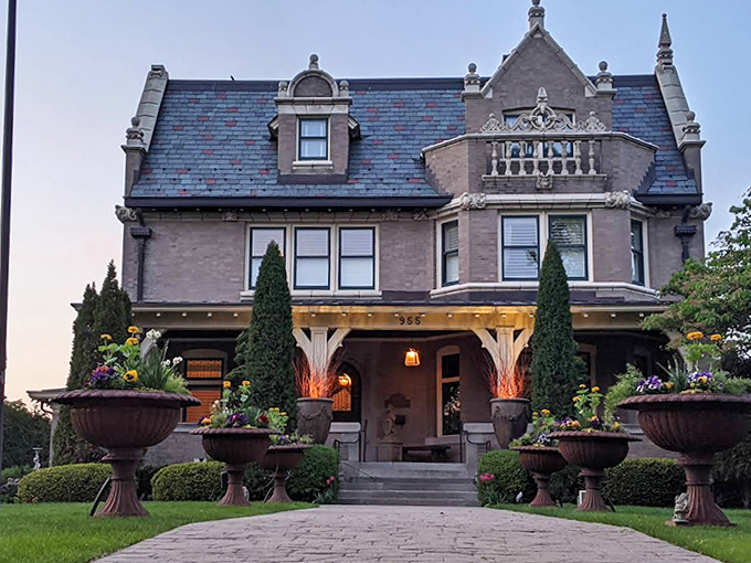 This elegant stone mansion whispers tales of Gilded Age soirées and horse-drawn carriages – if only these walls could dish the gossip!