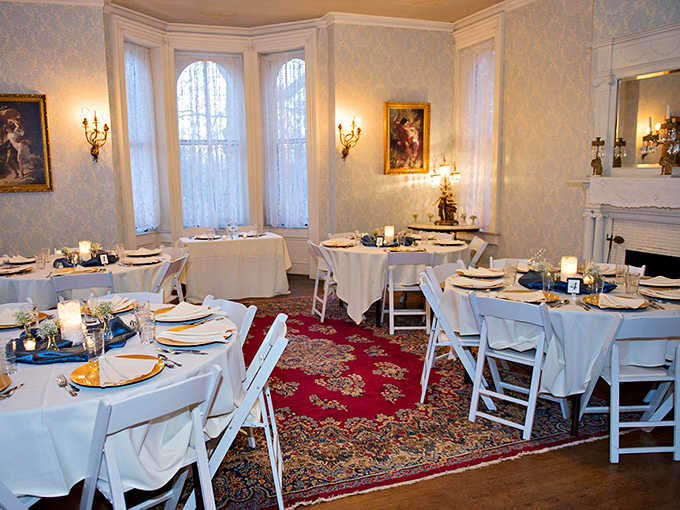 White tablecloths and elegant place settings await breakfast conversations that somehow feel more important surrounded by such refined walls.