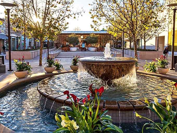 This fountain isn't just moving water – it's the community's liquid heartbeat, where kids make wishes and adults remember when they did too.