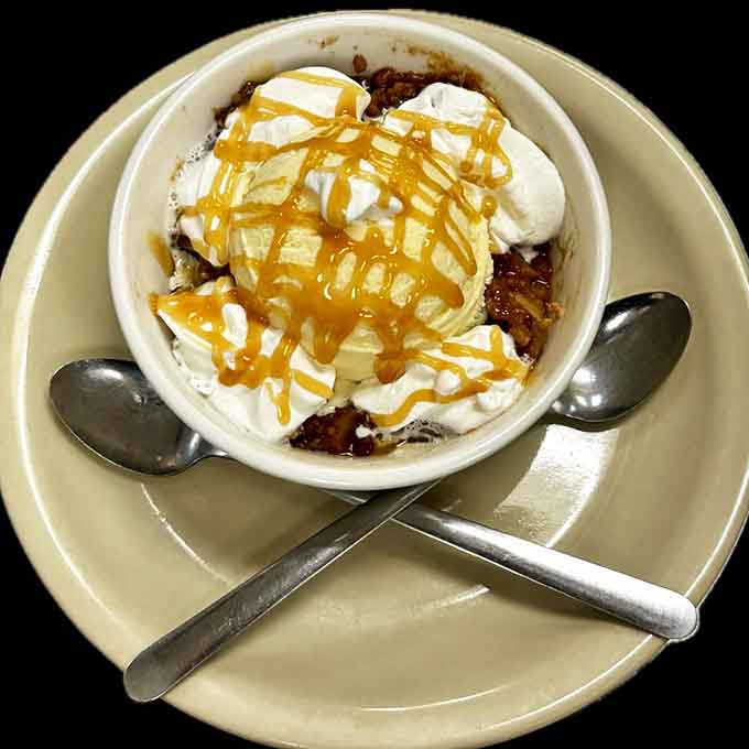 Warm apple crisp topped with vanilla ice cream and caramel creates a temperature tango in your mouth &ndash; hot, cold, sweet, and utterly irresistible.