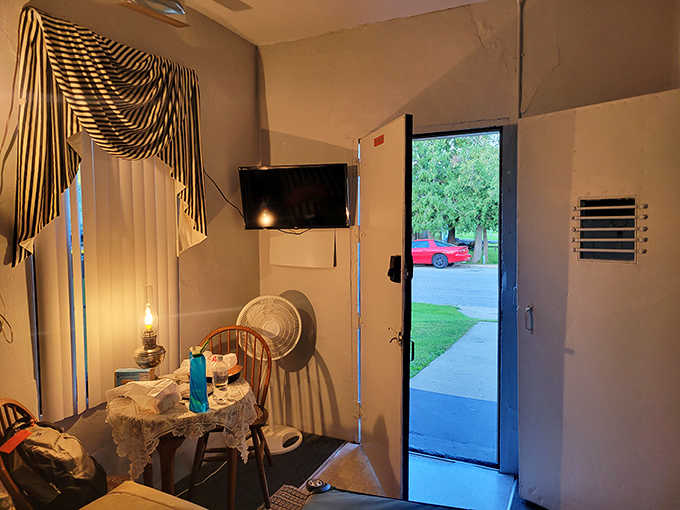 The entrance reveals a surprisingly inviting interior, where history and hospitality merge to create a truly unique overnight experience.