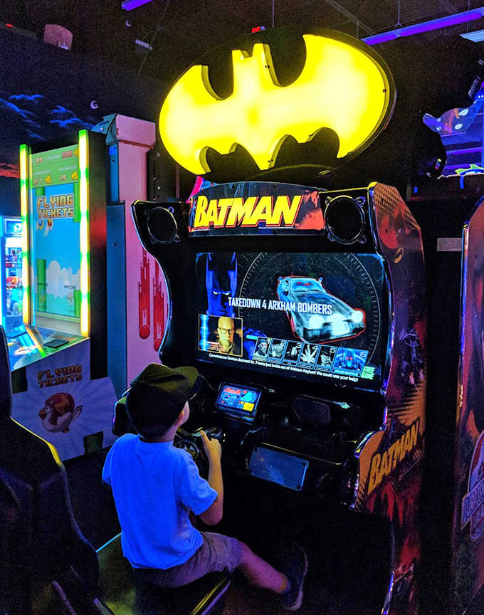 Young crime-fighters test their skills against Gotham's villains. Batman's watchful glow ensures justice prevails in this corner of the arcade.