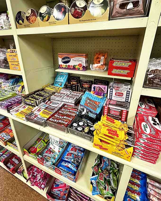 Classic candies and modern treats share shelf space, bridging generations of sweet tooths in a display that's both nostalgic and current.