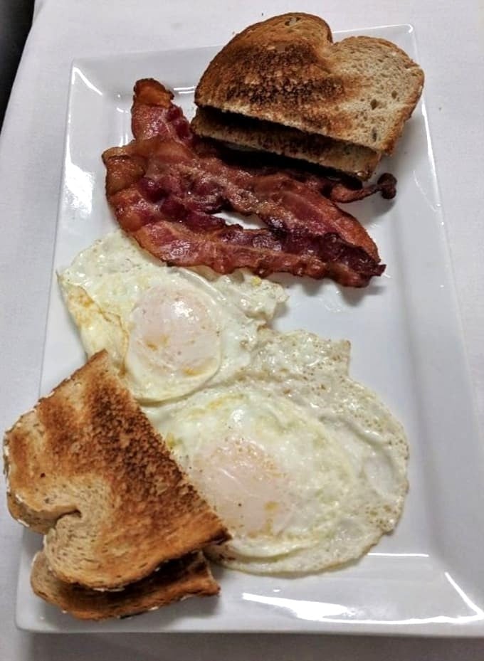 The breakfast that launched a thousand productive days &ndash; eggs, bacon, and toast executed with the respect they deserve.