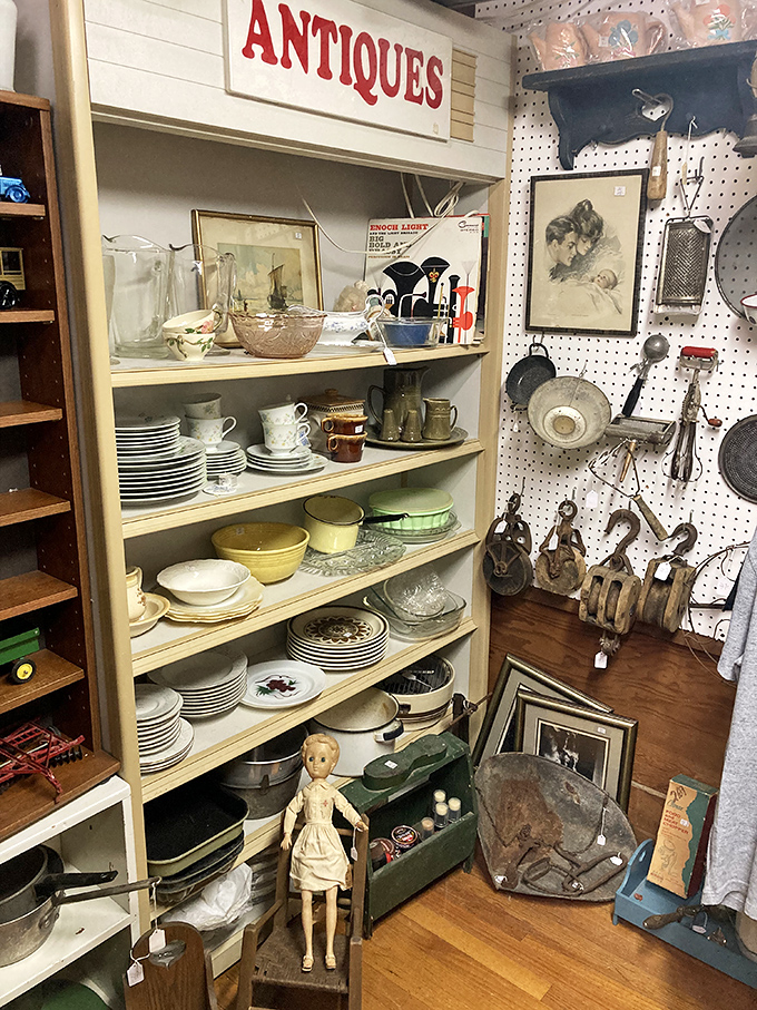 Shelves lined with vintage dishware tell stories of family dinners and special occasions, their patterns and colors reflecting changing American tastes.