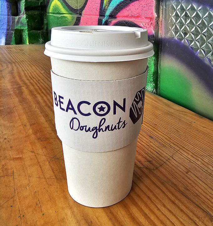 Coffee and donuts &ndash; a relationship more dependable than most marriages, served in a cup that's practically begging for a road trip.