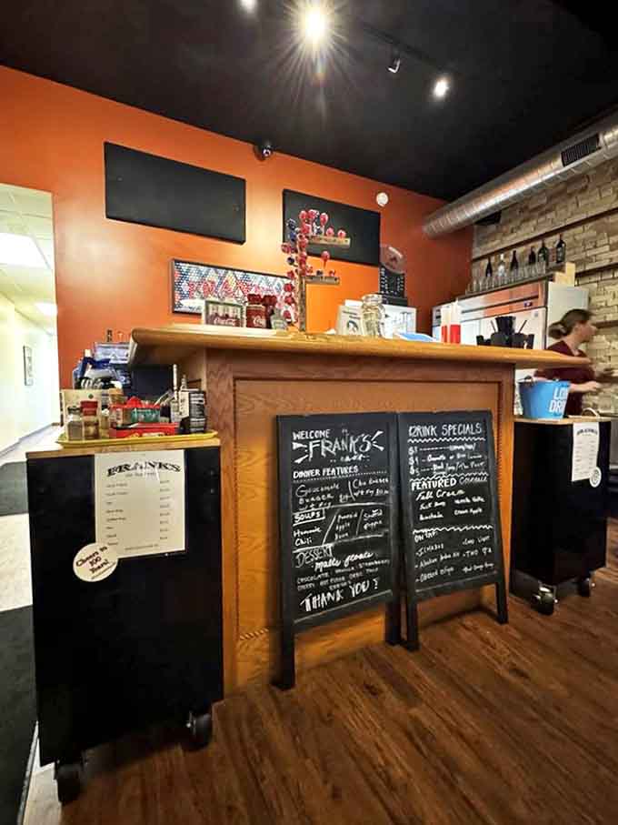 Counter: The command center of deliciousness, where milkshakes are born and burger dreams come true under vintage memorabilia.