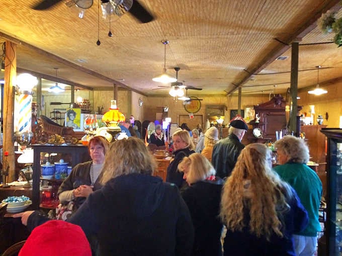 The Trading Outpost buzzes with treasure hunters &ndash; a community forms as visitors share stories and discoveries among the carefully curated collections.