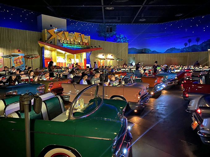 The theater fills with vintage cars facing the big screen, creating the world's most comfortable traffic jam you'll ever experience.