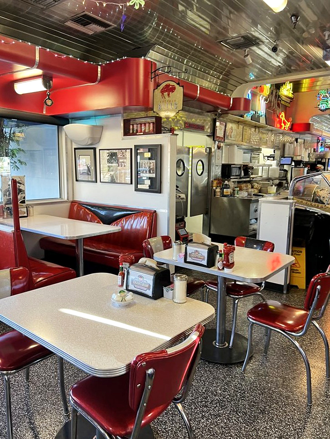 Social distancing, diner-style: clear dividers between booths keep safety on the menu without sacrificing that classic Chase's atmosphere.