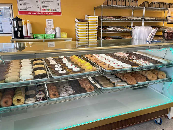 The display case showcases dozens of miniature flavor bombs &ndash; from classic glazed to wild combinations that sound like they were conceived during an especially inspired jam session.