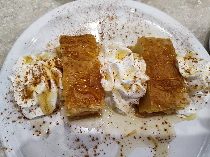 Sweet bliss! The Galaktoboureko, drenched in honey and cinnamon, is the perfect, creamy Greek dessert finish.