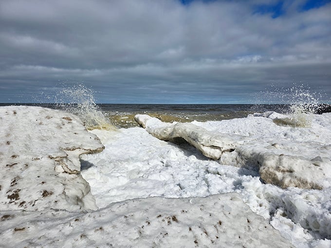 Winter's artistic touch &ndash; frozen waves create sculptural formations along the shore during Lake Erie's coldest months.