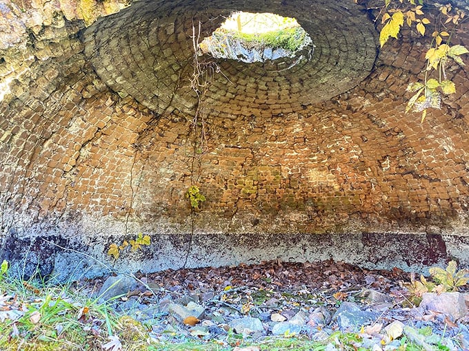 Inside the beehive: Looking up through the damaged dome reveals the ingenious brick construction that once contained intense heat.