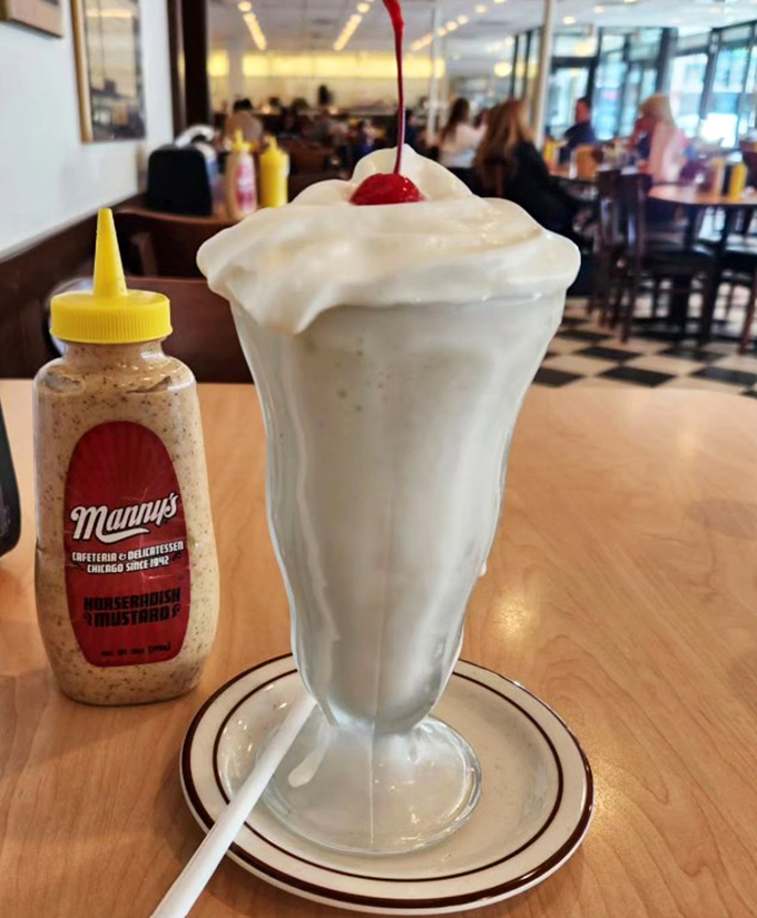 This vanilla milkshake isn't just a drink, it's a dessert commitment &ndash; thick enough to require serious straw strength and determination.