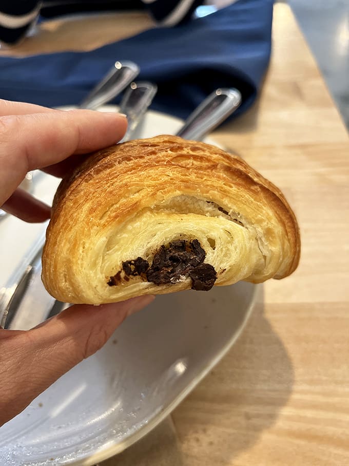 That pain au chocolat cross-section reveals the kind of lamination that would make French bakers nod with grudging respect.