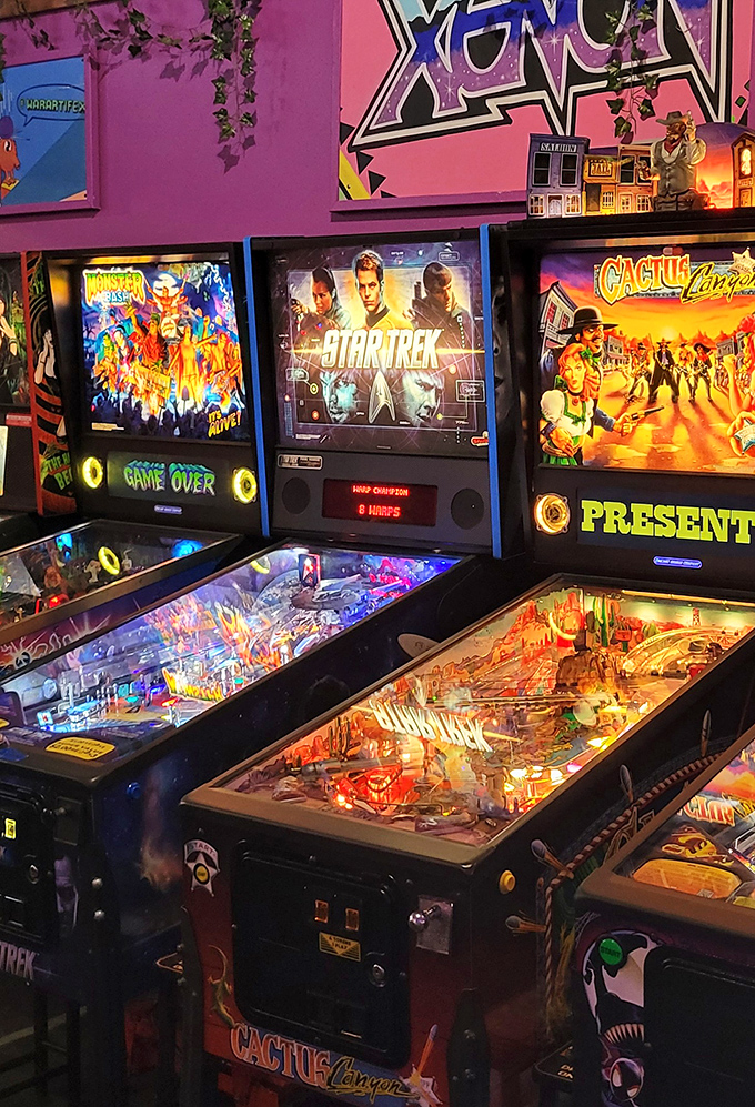 Pinball machines line up like mechanical works of art, their playfields glowing with the promise of flipping, bumping satisfaction.