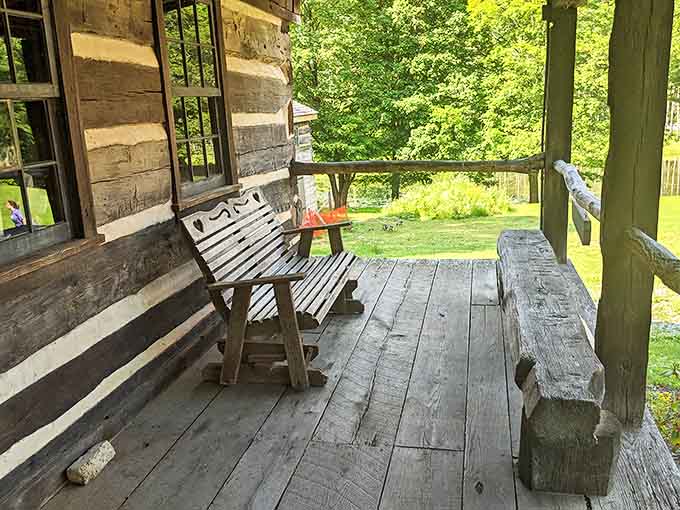 A rustic porch with a simple wooden bench invites visitors to sit a spell, as our grandparents might say, and watch the world slow down.