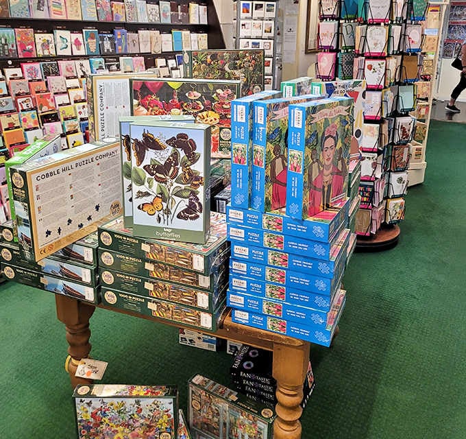 Puzzles stacked high for those who believe the best entertainment doesn't require electricity or Wi-Fi, just patience and determination.