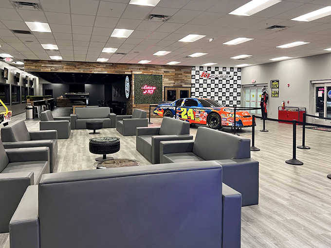 Modern reception area welcomes speed seekers with comfortable seating and racing memorabilia – your first taste of the adrenaline to come.
