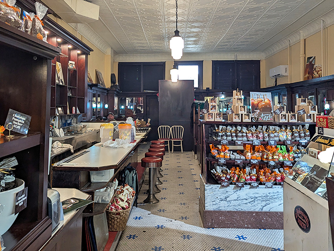 The pressed tin ceiling and vintage fixtures aren't trendy design choices &ndash; they're original features that have witnessed generations of first dates, celebrations, and chocolate-induced euphoria.