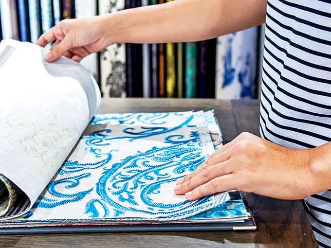 Sample books let you take the decision-making process home, because choosing fabrics under pressure is how regrettable upholstery choices happen.