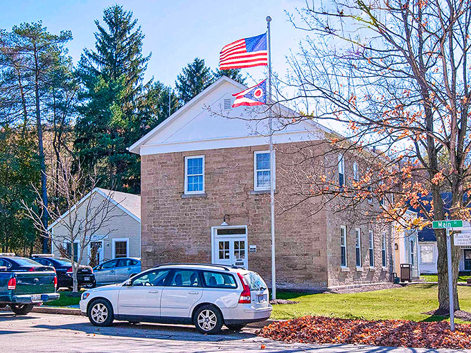 Peninsula's historic town hall stands proud, a testament to civic pride and architecture from an era when buildings had personality.