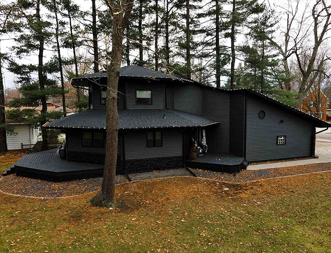 The home's exterior reveals its unique octagonal shape, a architectural choice as unconventional as its color scheme.