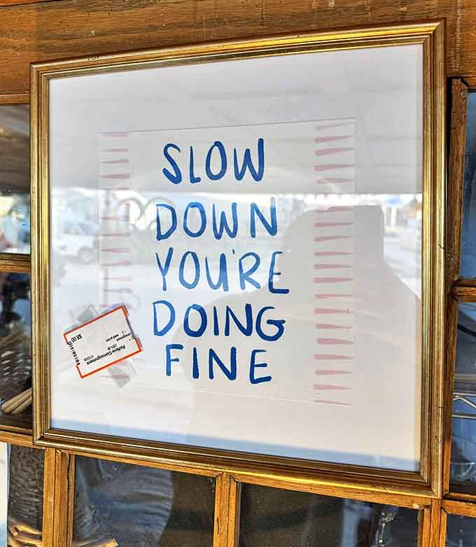 Newspaper clippings celebrate Val's 50-year milestone, telling the story of a humble burger joint that became a Minnesota institution.