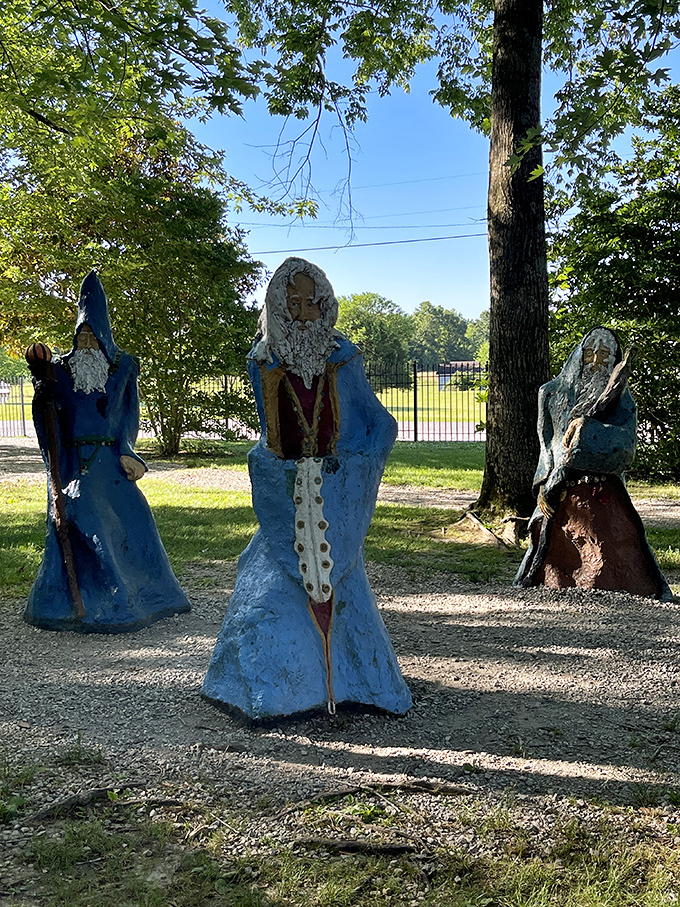 Blue-robed wizards gather in silent conference, their long beards and flowing garments giving them the gravity of ancient sages.