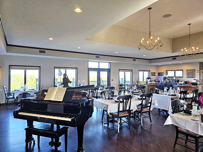 Dining Area: Elegant simplicity defines this bright dining room, where a grand piano waits to provide the soundtrack for unforgettable wine-paired meals.