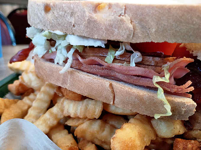 Not just a sandwich but a pork celebration &ndash; layers of bacon nestled between fresh vegetables, proving simplicity can be spectacular.