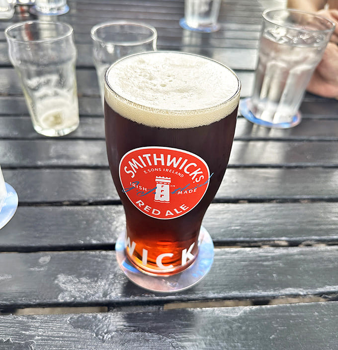 A properly poured Smithwick's Irish Red Ale&mdash;the perfect companion to cut through the richness of Irish comfort food.