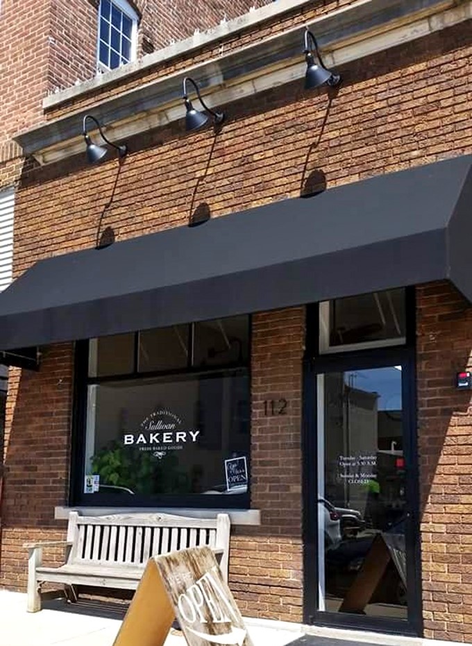 Traditional Sullivan Bakery's simple brick exterior hides extraordinary treats within. The welcoming bench invites you to sit and savor your selections.