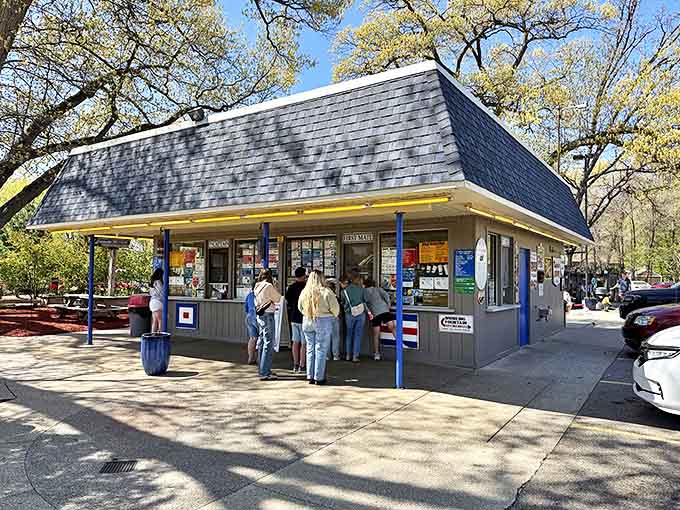 Dappled shade makes waiting in line at Captain Sundae a pleasant experience. The modest building houses some of Michigan's most beloved frozen creations, drawing crowds throughout summer.