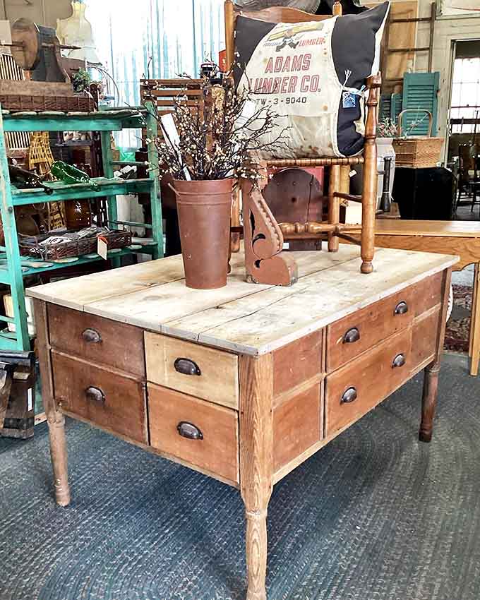 This antique table with multiple drawers once organized someone's life &ndash; perhaps a shopkeeper's inventory or a seamstress's supplies &ndash; now waiting for its next chapter.