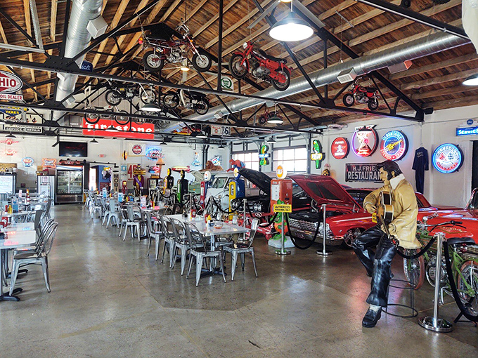 Every inch tells a story – from vintage motorcycles overhead to classic cars parked tableside, eating here is time travel with a side of fries.