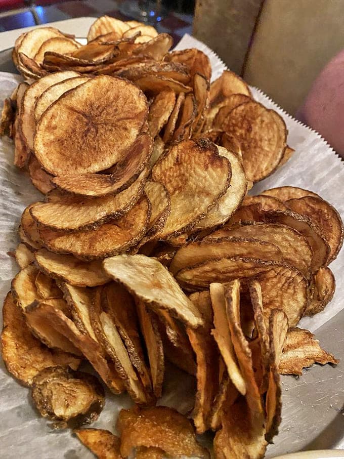 These house-made potato chips aren't just a side dish&mdash;they're an addictive reminder that simple pleasures are often the most satisfying.