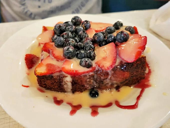 French toast that dreams are made of – crowned with fresh berries that pop against the warm, cinnamon-kissed bread.