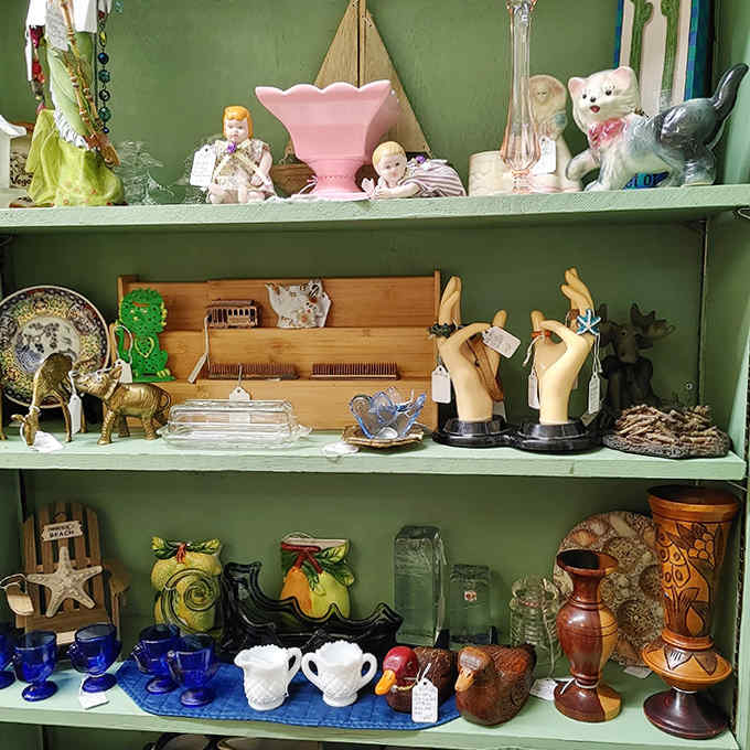 These shelves showcase the delightful oddities of bygone eras, from ceramic animals to decorative vessels with stories to tell.